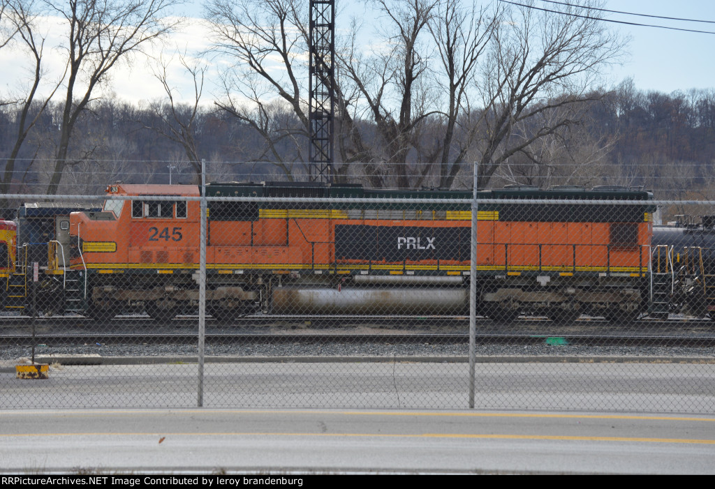 PRLX 243 on a inbound train tied down at knoche yard